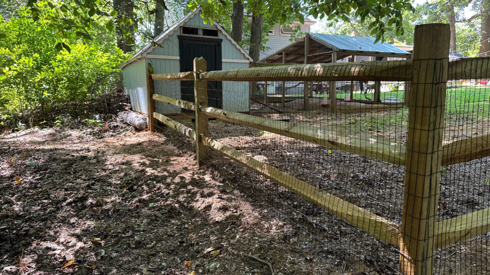 Rustic Post and Rail Fence With Black Welded Wire